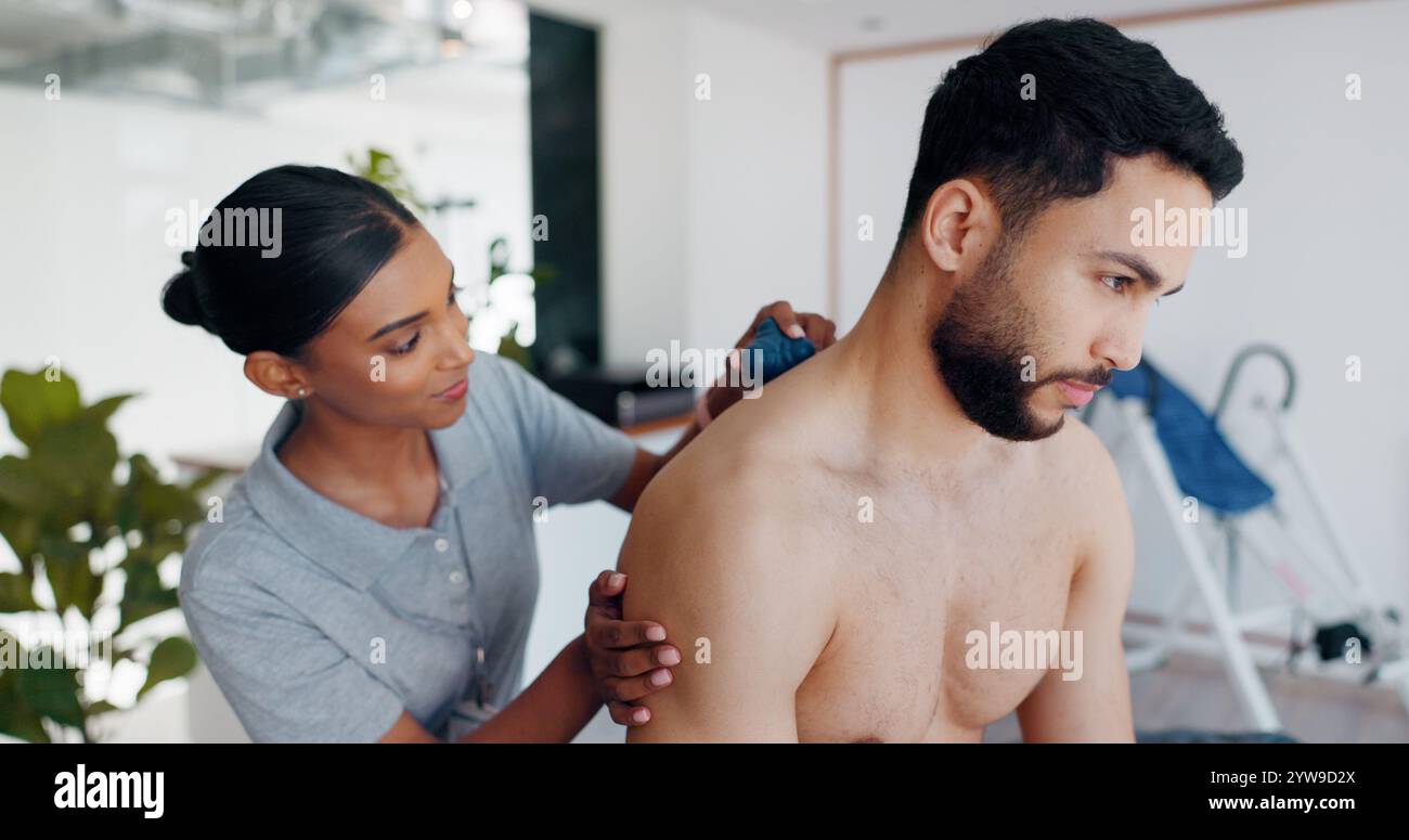 Massage ball, physiotherapy and shoulder with people in clinic for deep ...