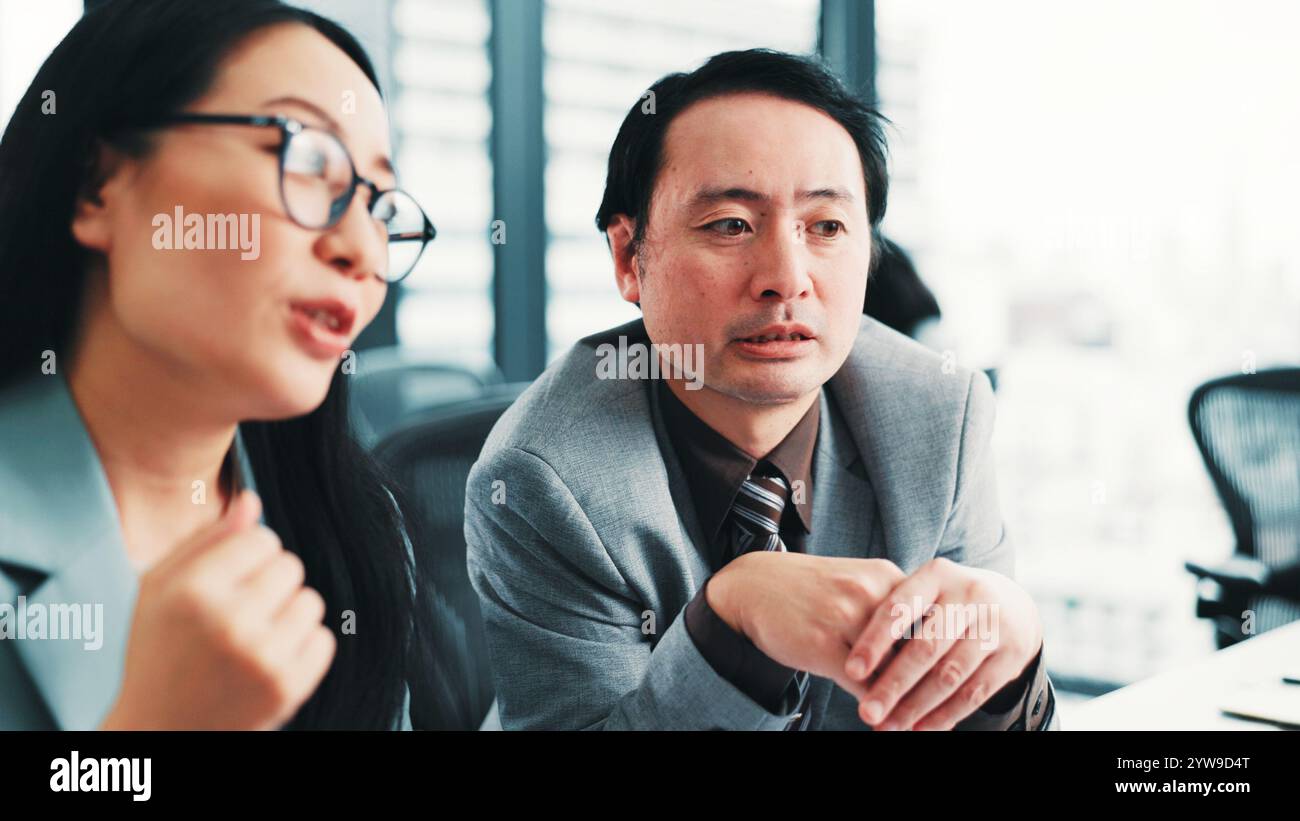 Japanese, business people and teamwork in office for feedback, review ...