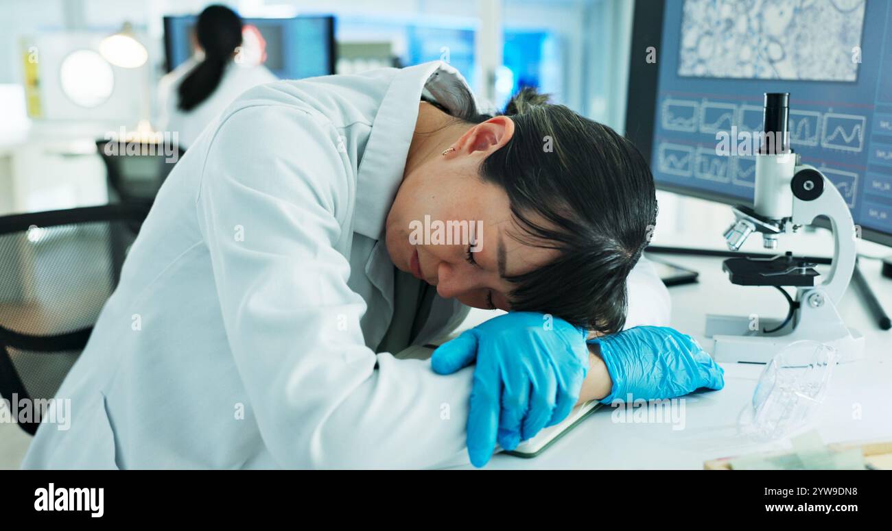 Sleeping, tired and scientist with headache, lab and fatigue for ...