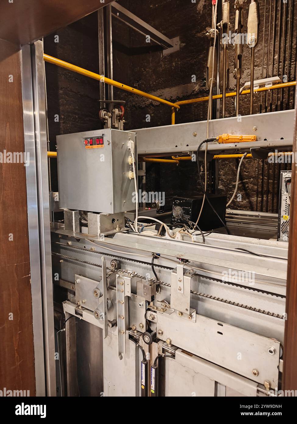 Industrial elevator system exhibits mechanical components and workings ...