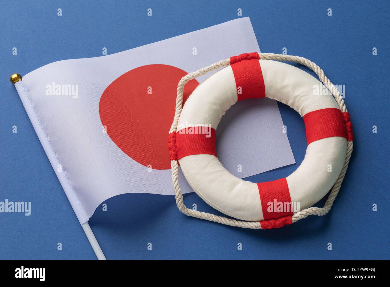 Flag and lifebuoy on color background, Japan aid theme concept Stock ...