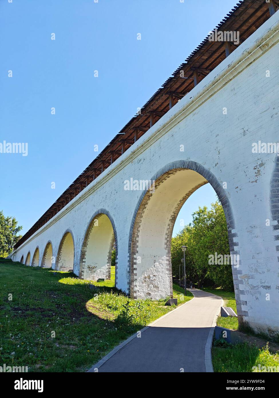 A view of a historic aqueduct featuring multiple arches, set against ...