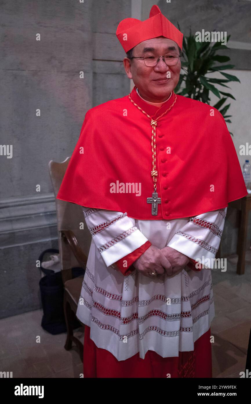 Newly-appointed Cardinal Tarcisio Isao Kikuchi is congratulated during ...