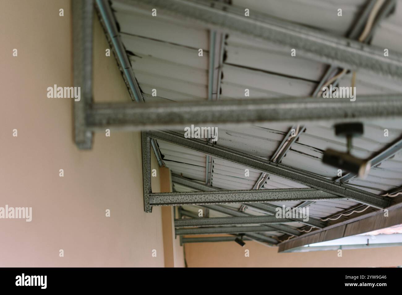 Lightweight steel roof trusses arranged to support roofing tiles ...