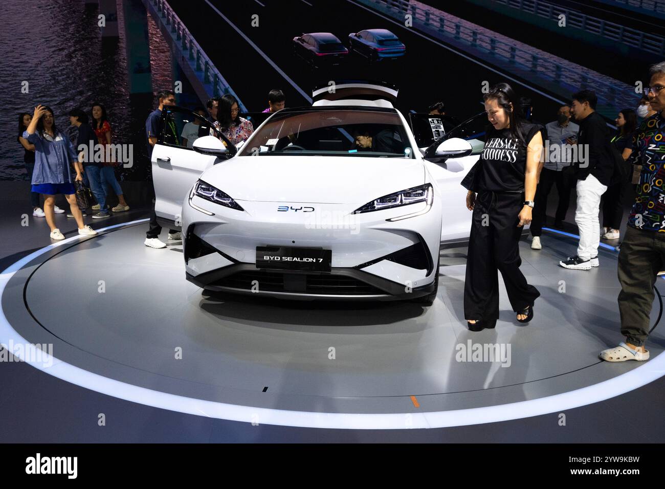 Visitors inspect a BYD Sealion 7 car during the 41th Thailand ...