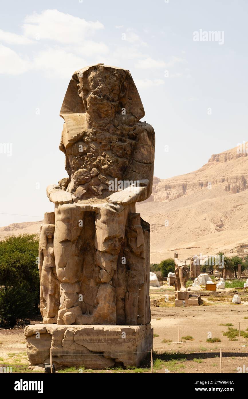 The giant Colossi of Memnon. All that remains of the Temple of ...