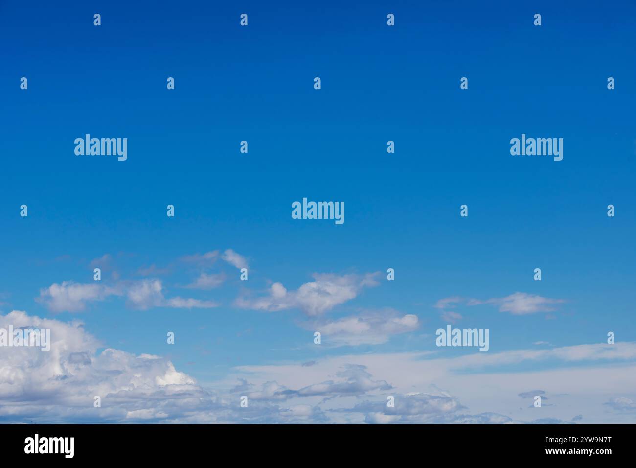 Landscape of a blue sky with clouds of various types and heights on a ...