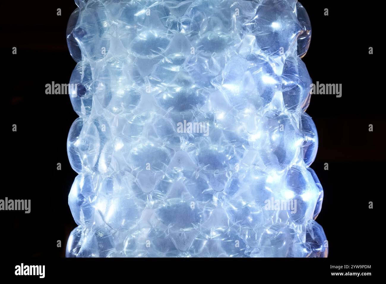 Roll of bubble wrap, plastic waste, close up, dark background,free copy ...