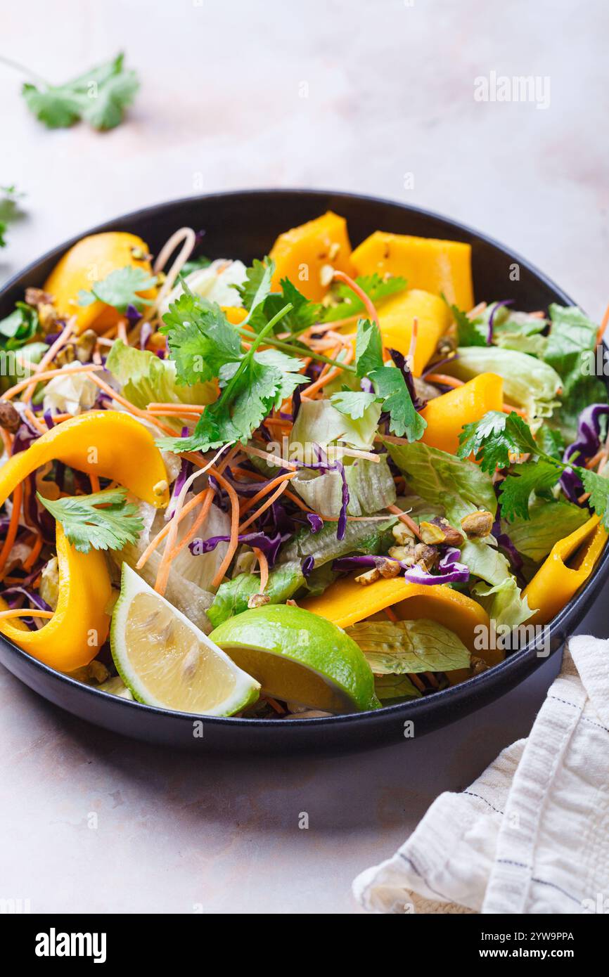 Vietnamese mango salad with nuts and vegetables, close-up Stock Photo ...