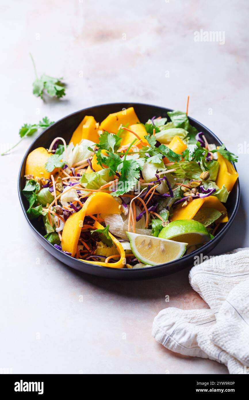 Vietnamese mango salad with nuts and vegetables, close-up Stock Photo ...