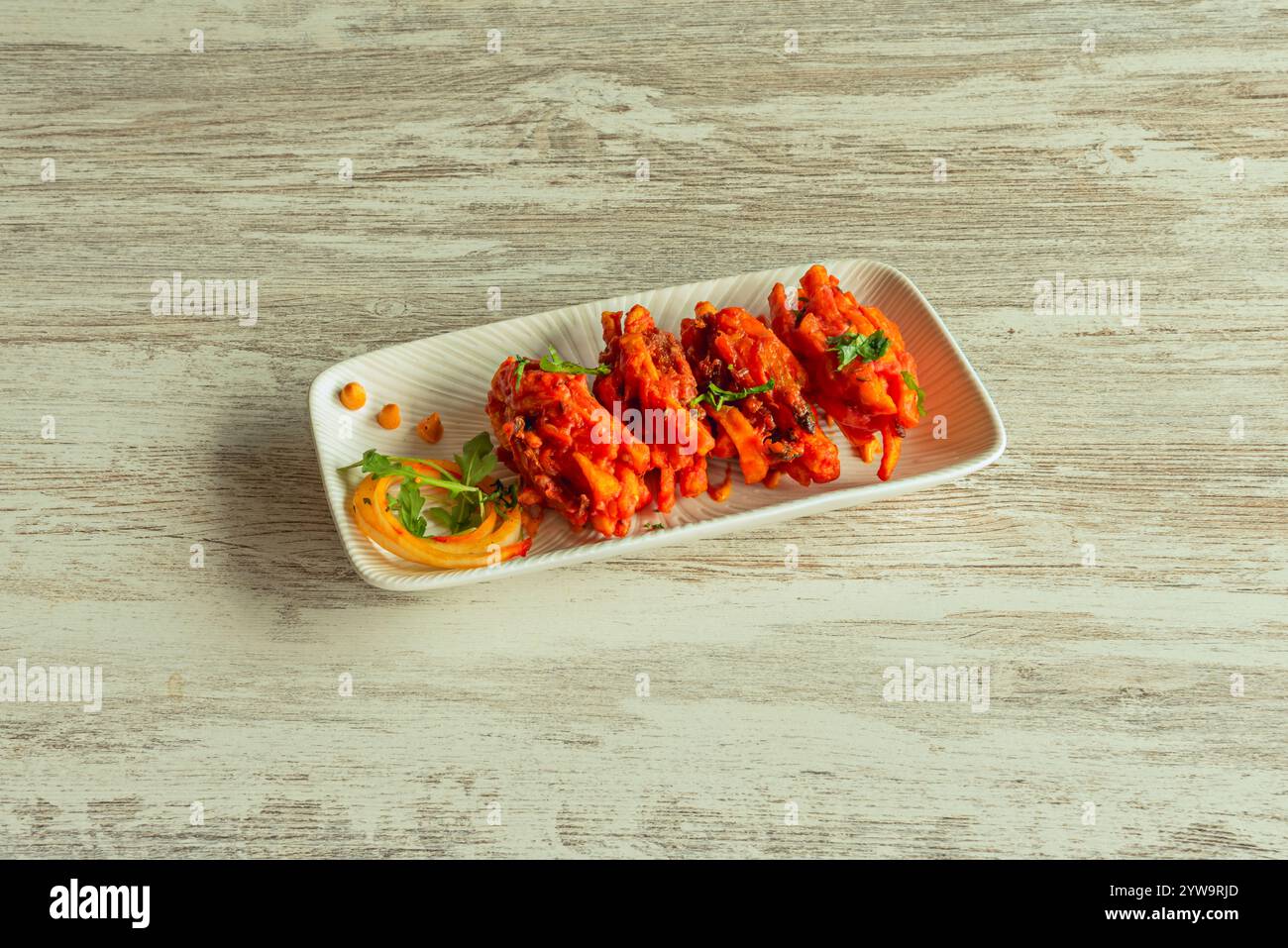 Pakora is a type of dish originating from India, Pakistan and ...