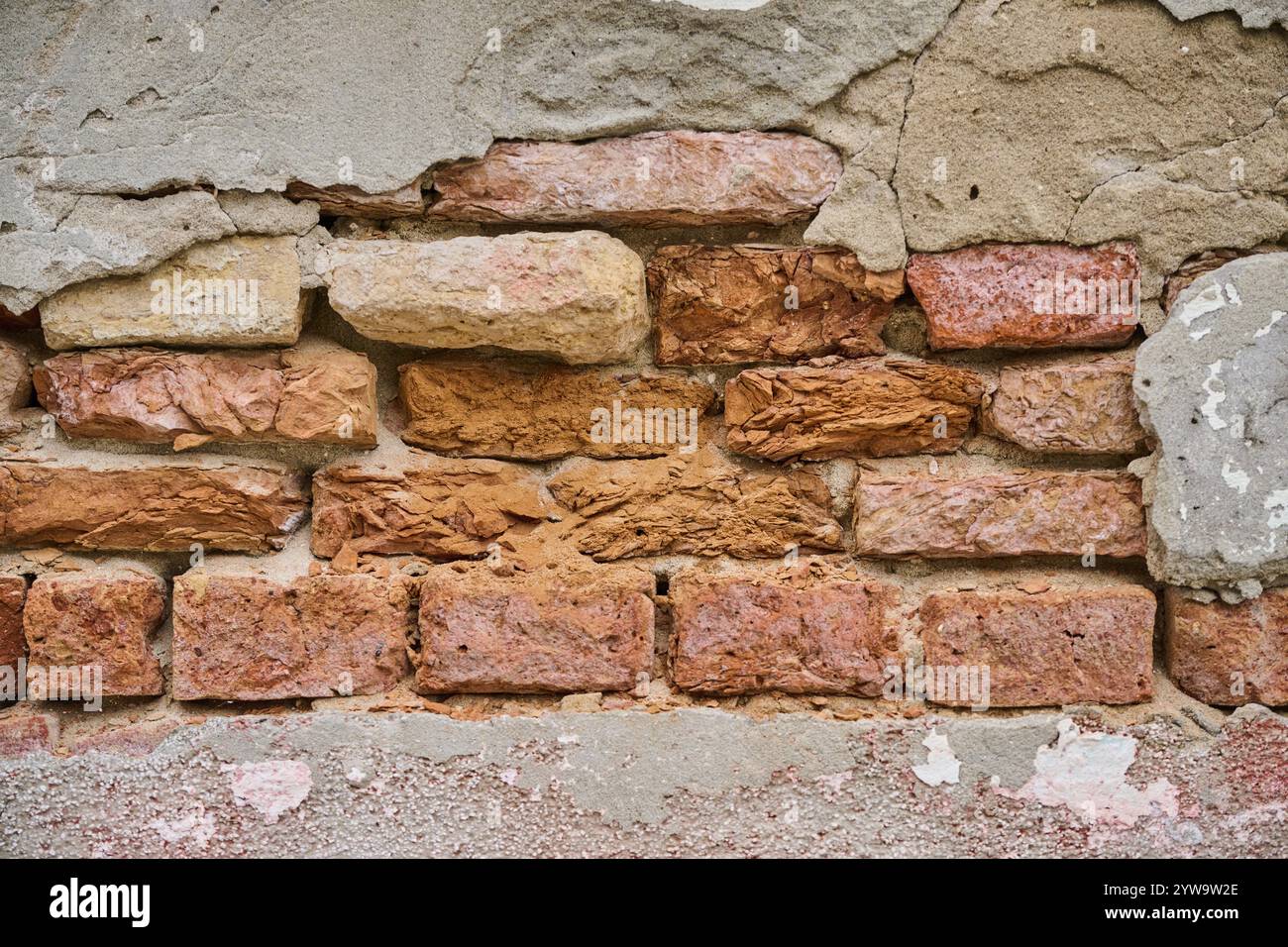Detail of an old ziggurat wall made of bakestone bricks, Burano, Venice ...