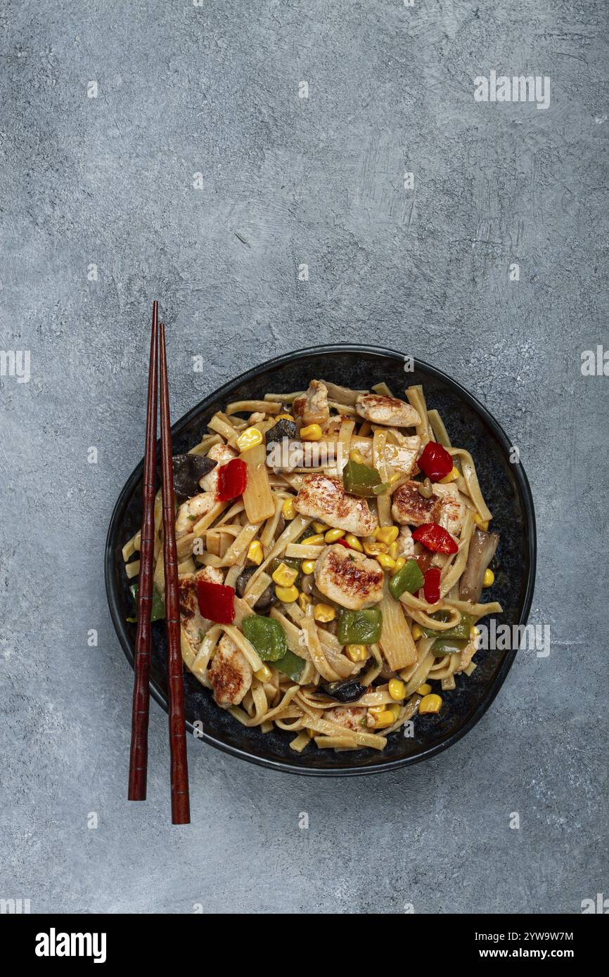 Fried noodles with chicken meat and vegetables, Bami Goreng, Indonesian ...