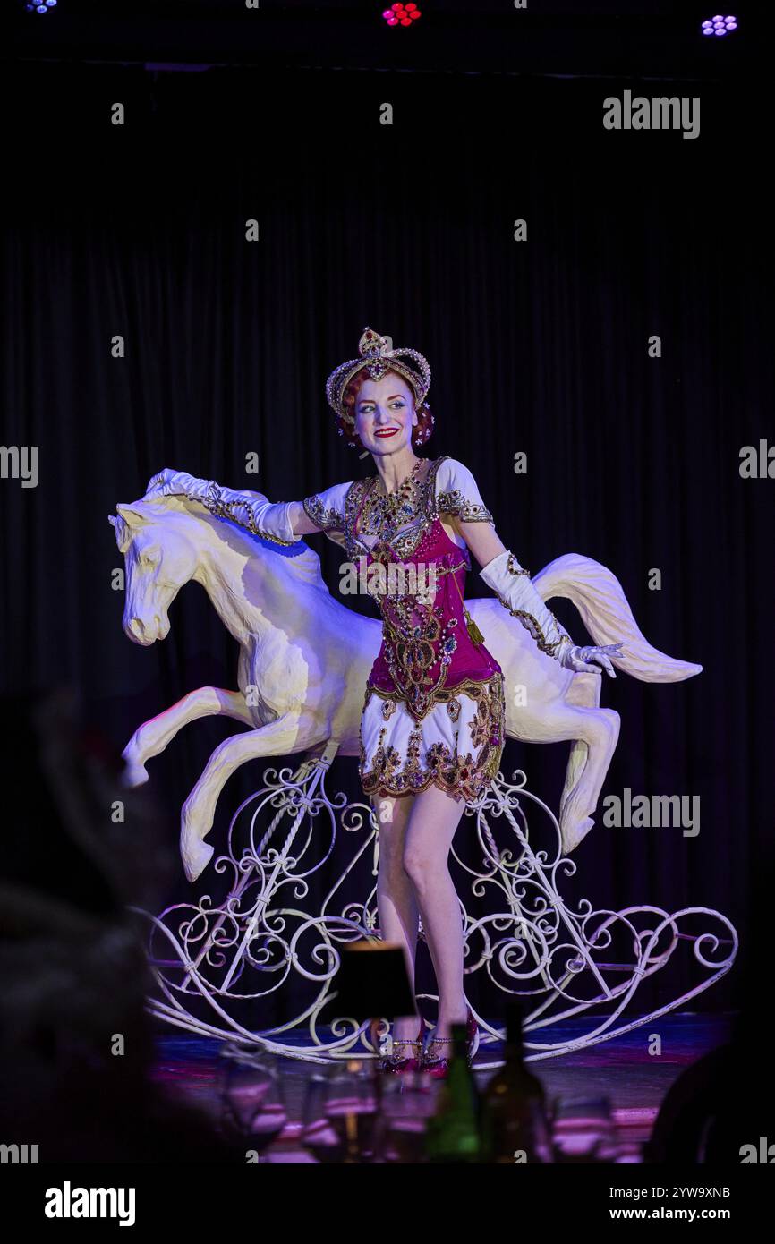 Pompously dressed young lady at a gala ball during a performance (Great ...