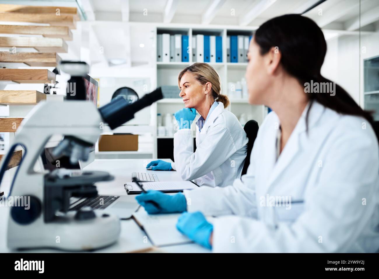 Thinking, science and tech in lab, women and colleagues with project ...