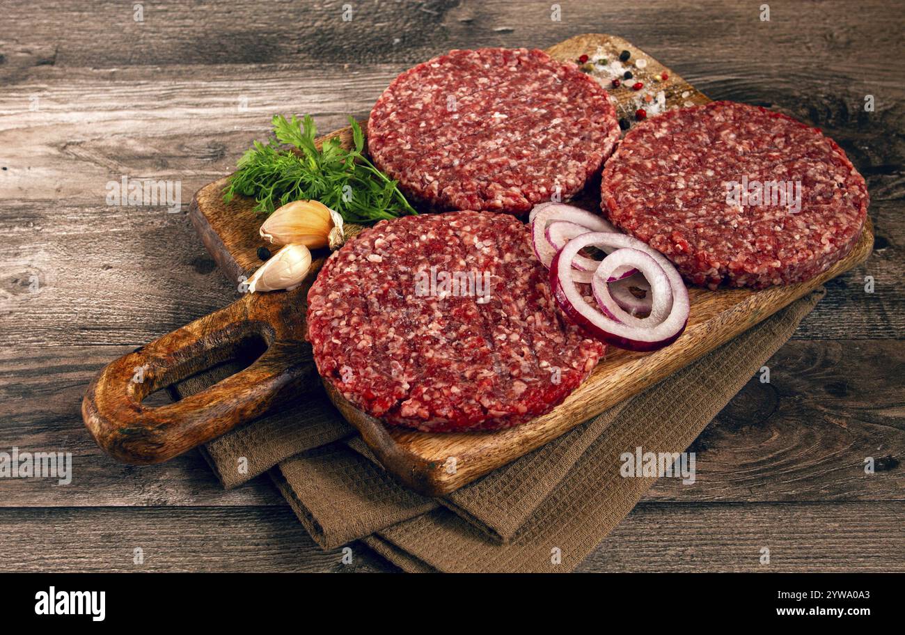 Raw hamburgers cutlets from hi-res stock photography and images - Alamy