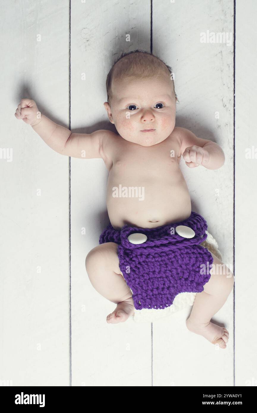 Baby, 1 month, full body portrait in cloth nappy, baby in portrait ...