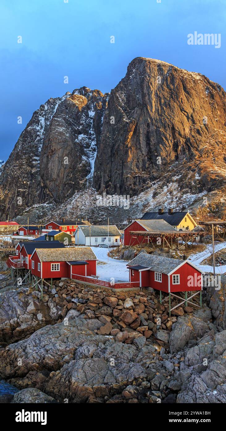 A winter sunrise over the Lofoten Islands in The Reine village features ...