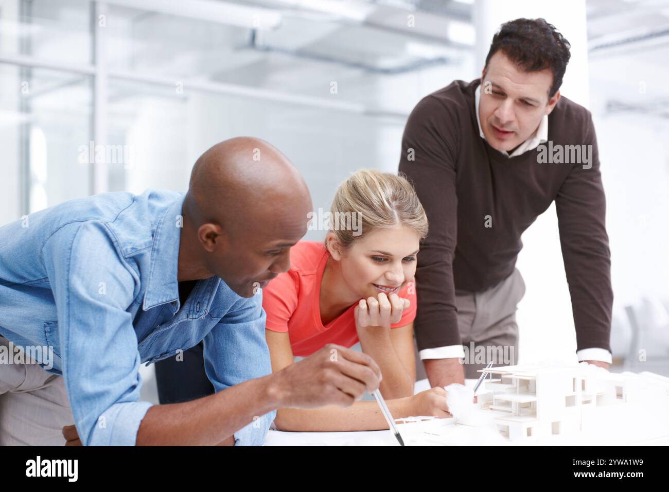 Blueprint, architecture and group in office, teamwork and conversation ...