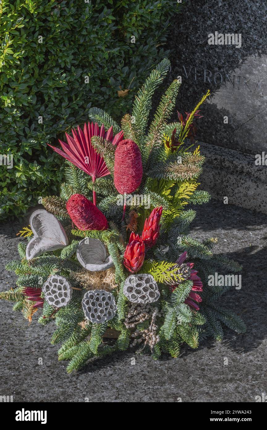 Grave decoration at the cemetery near the rococo church of St Ulrich ...