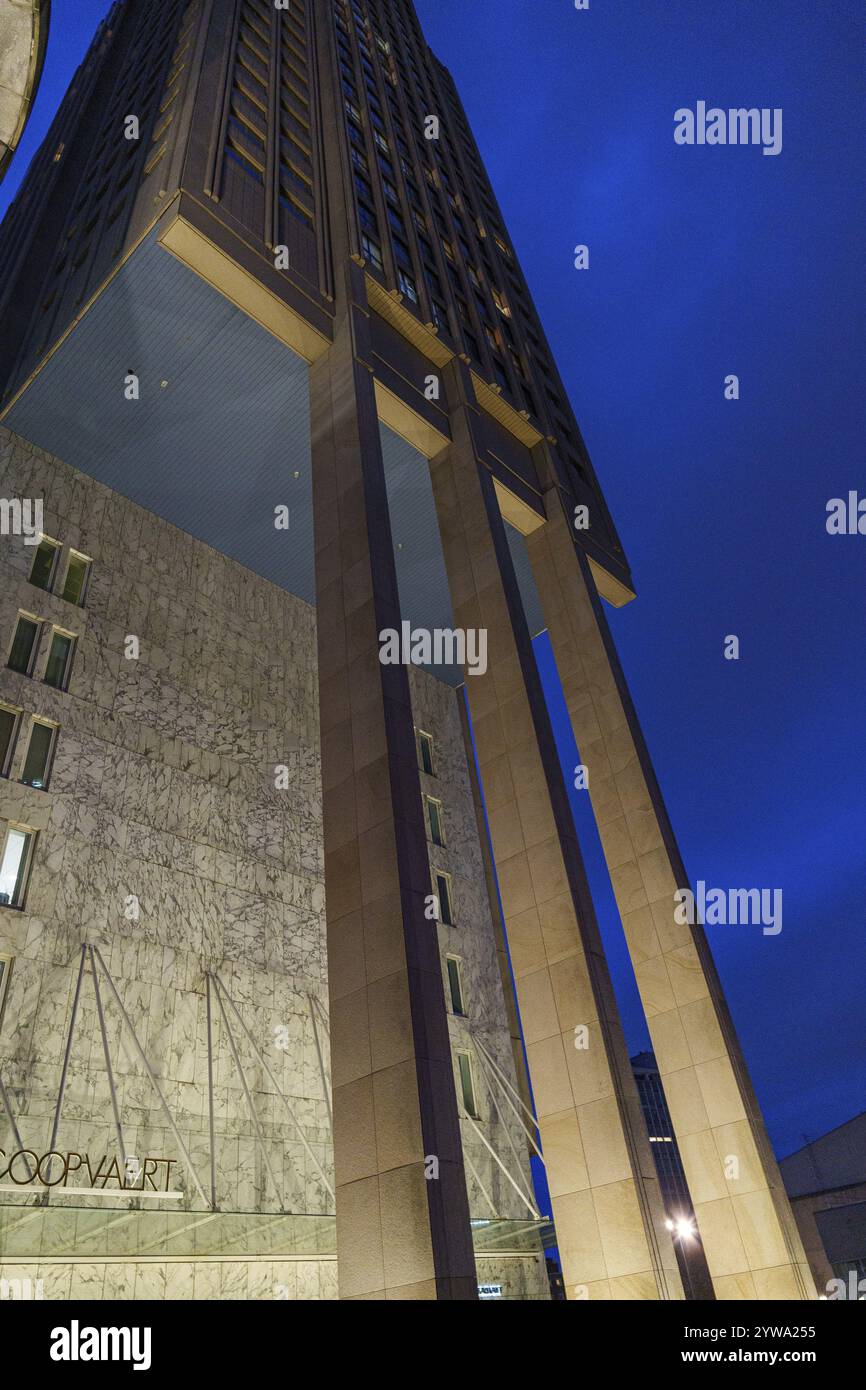 View of a tall building from below at night, illuminated, Rotterdam ...