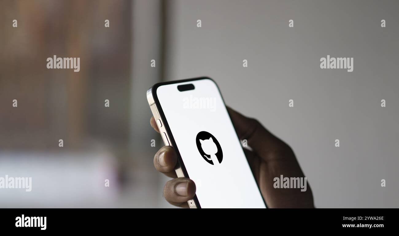 Github logo is displayed on smartphone Stock Photo - Alamy