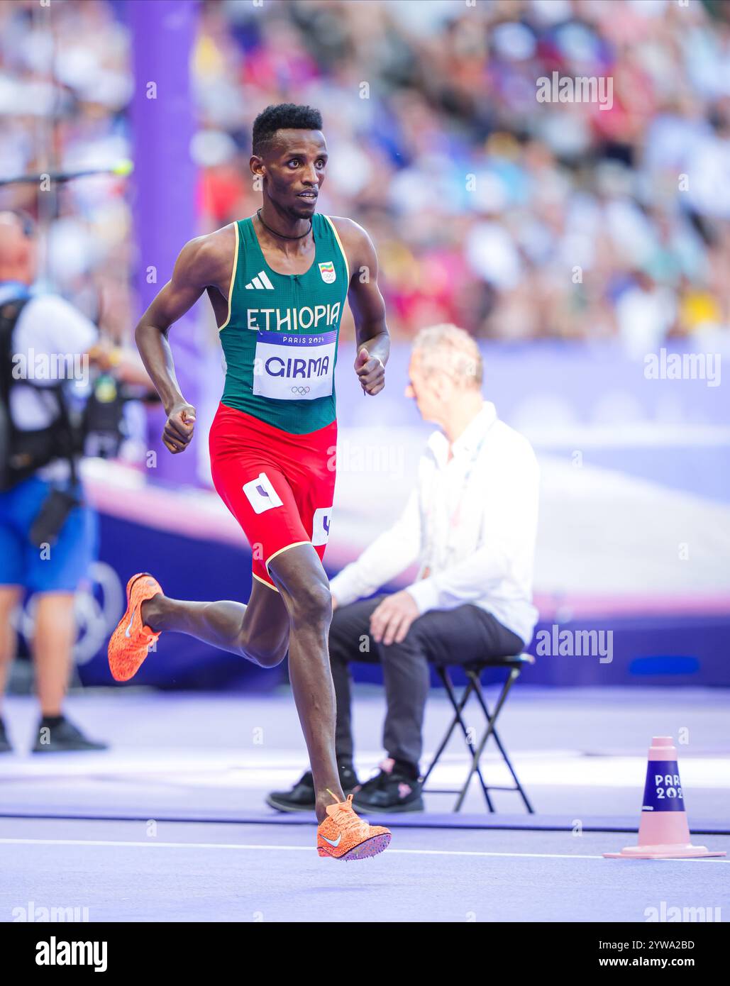 Lamecha Girma participating in the 3000 metres steeplechase at the ...