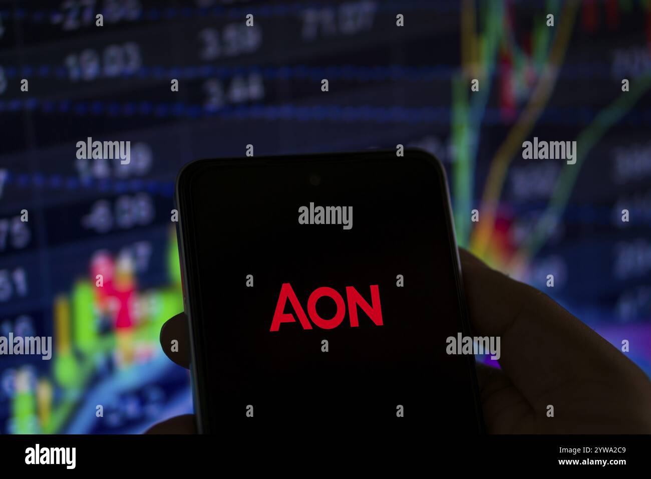 Smartphone displaying logo of Aon PLC, a British multinational professional services firm that ...