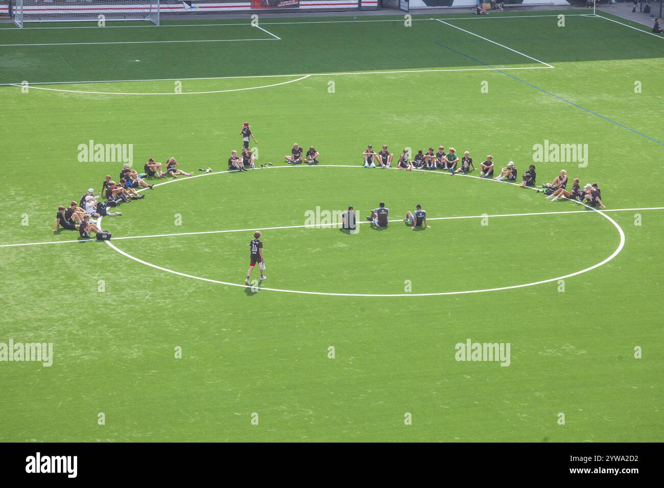 Football player at the centre circle, football pitch at Millerntor Stadium, football stadium, St ...