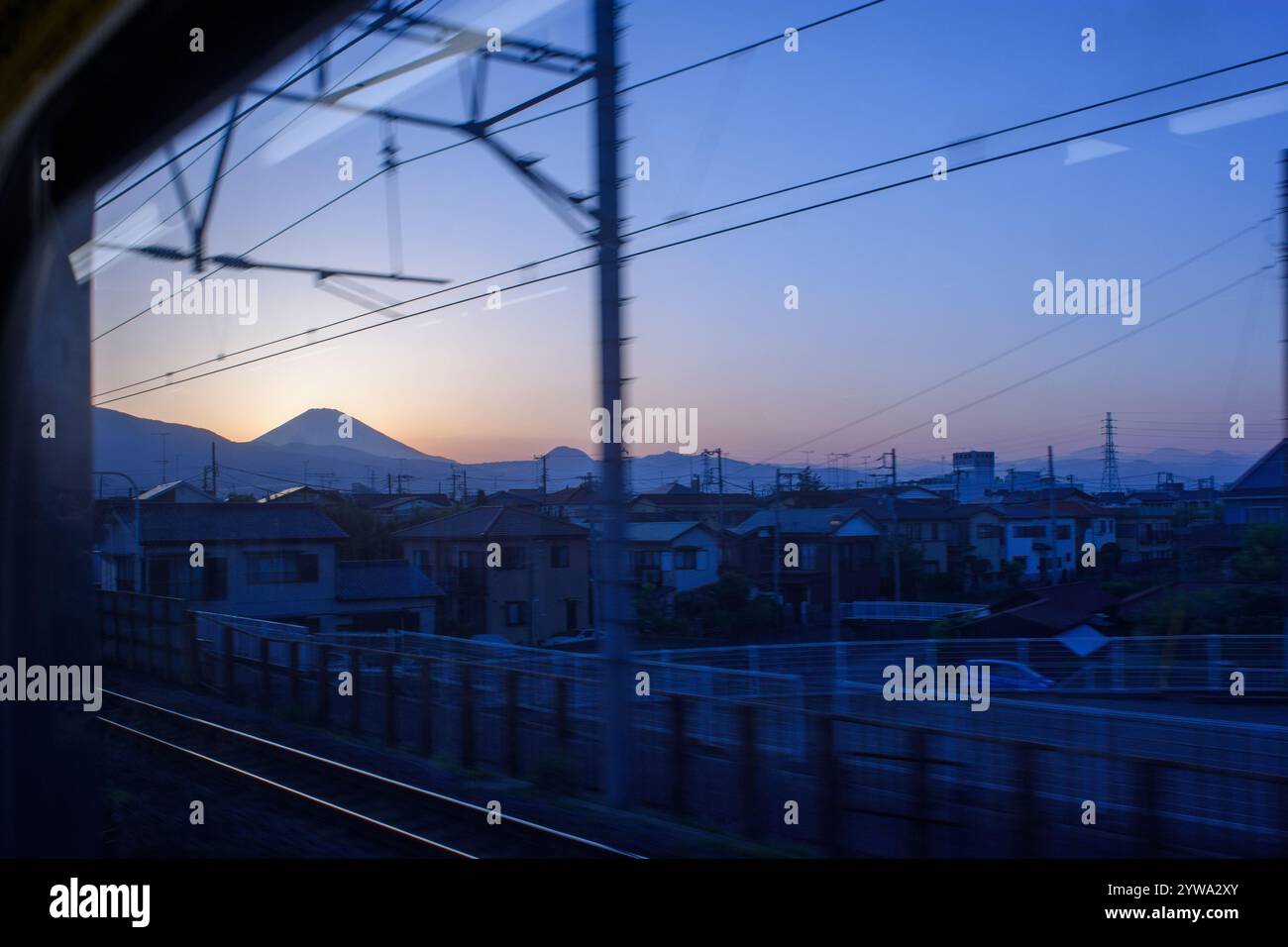 Mount Fuji silhouetted against sunset sky, view from Japanese ...