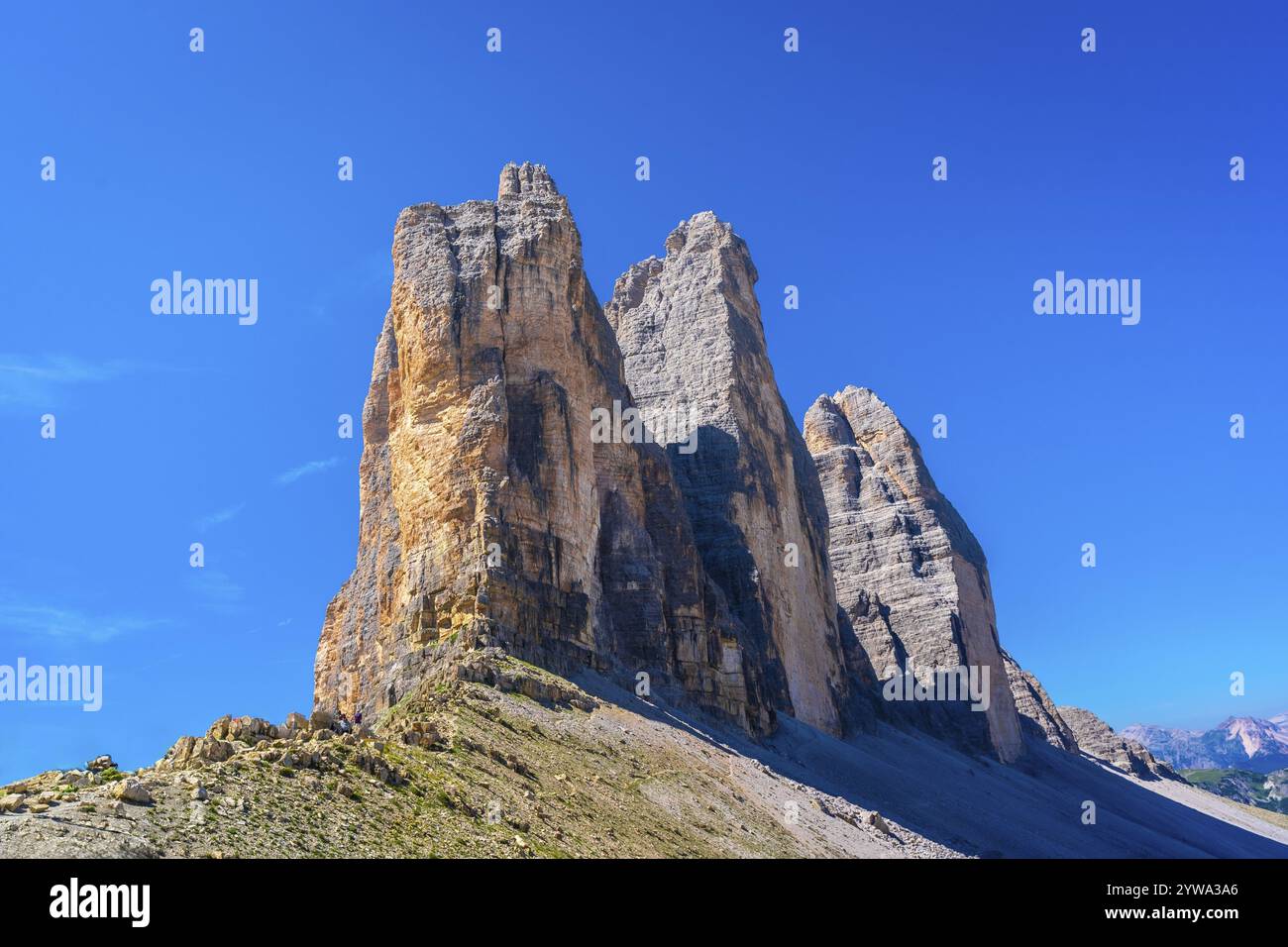 Majestic peaks of tre cime di lavaredo glowing under the summer sun ...