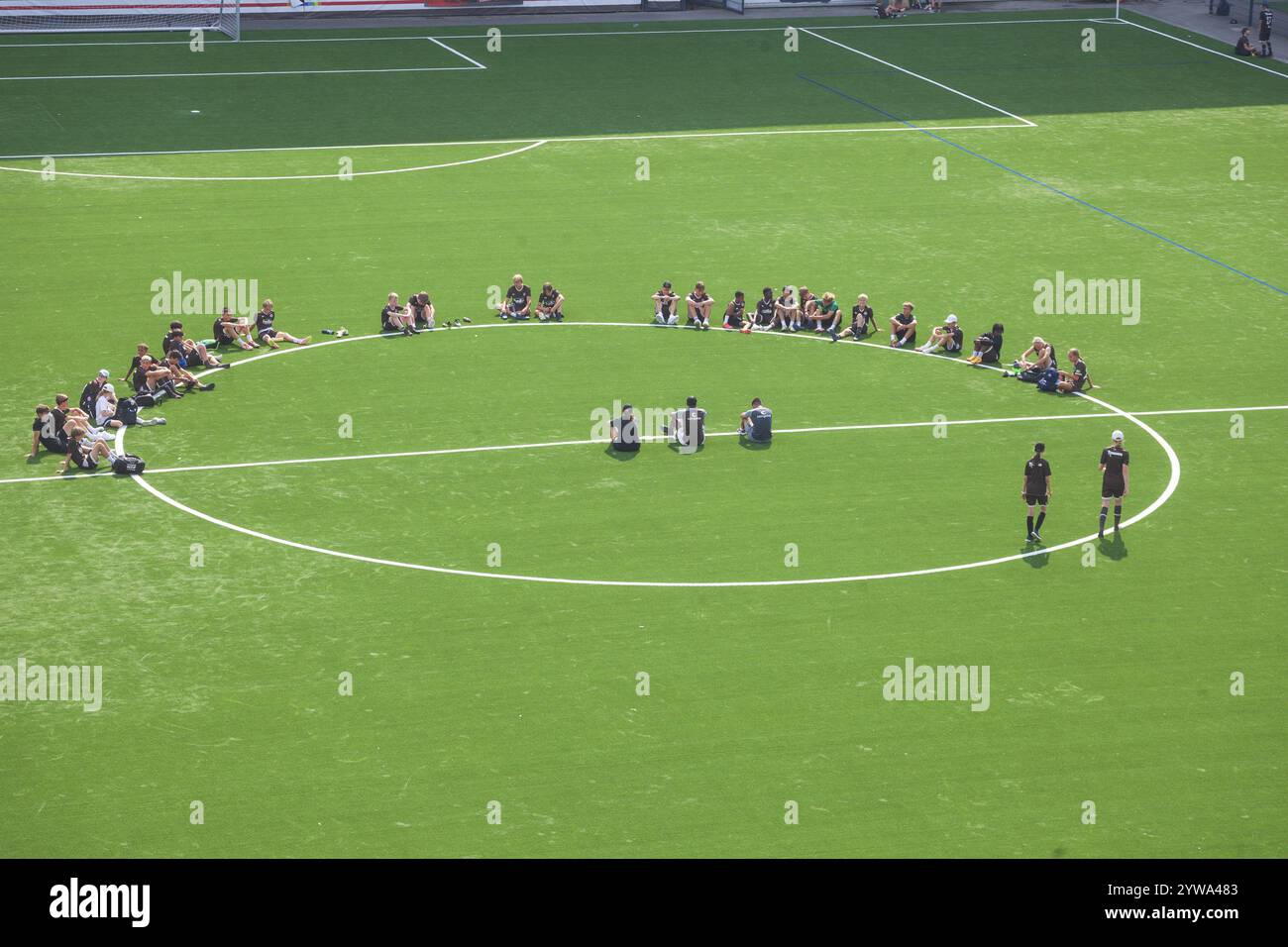 Football player at the centre circle, football pitch at Millerntor Stadium, football stadium, St ...