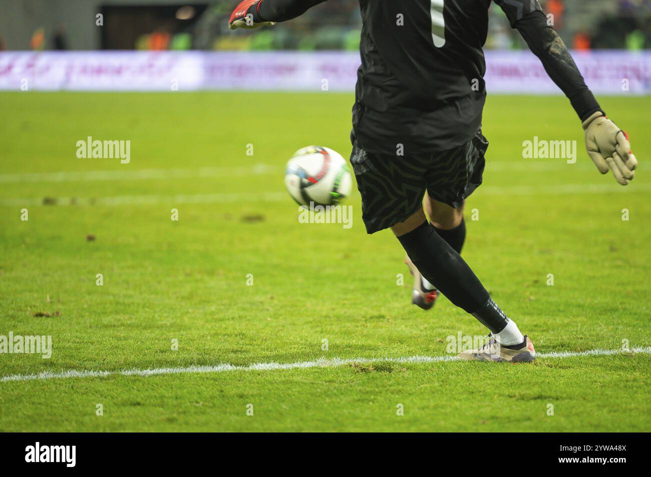 Goalkeeper kicks ball from 5 meters line during soccer match Stock ...