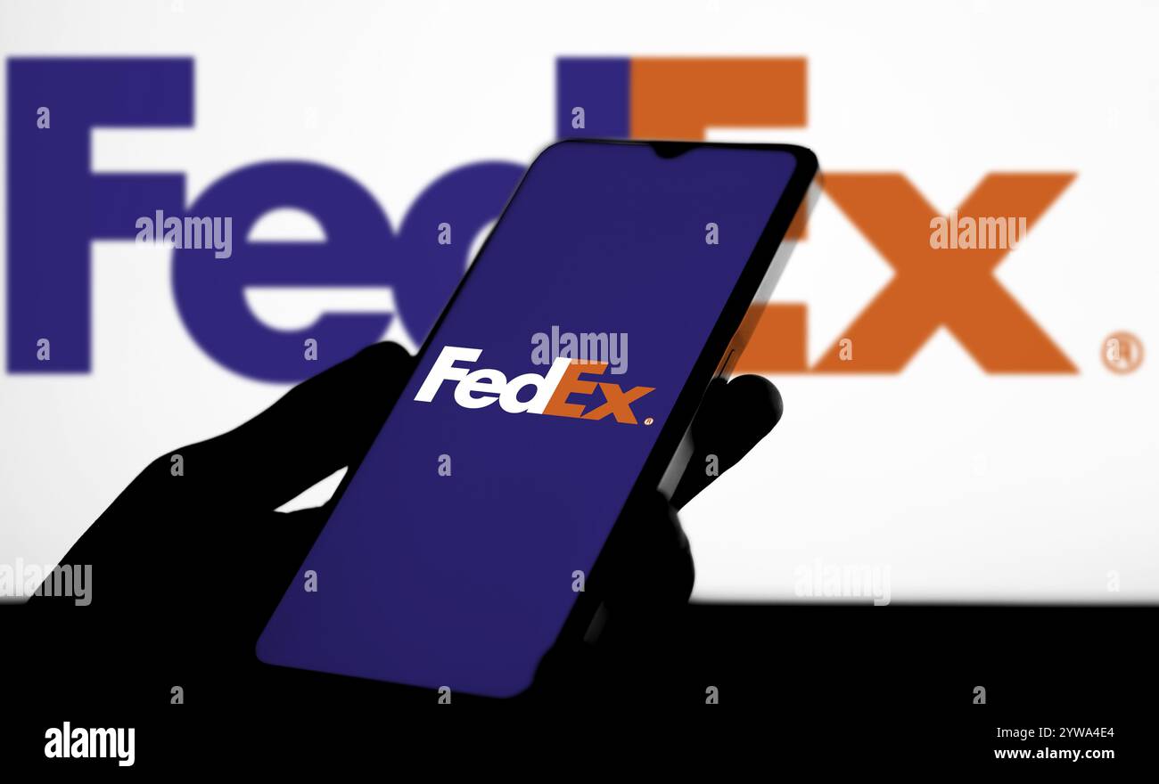 FedEx logo on smartphone Stock Photo - Alamy