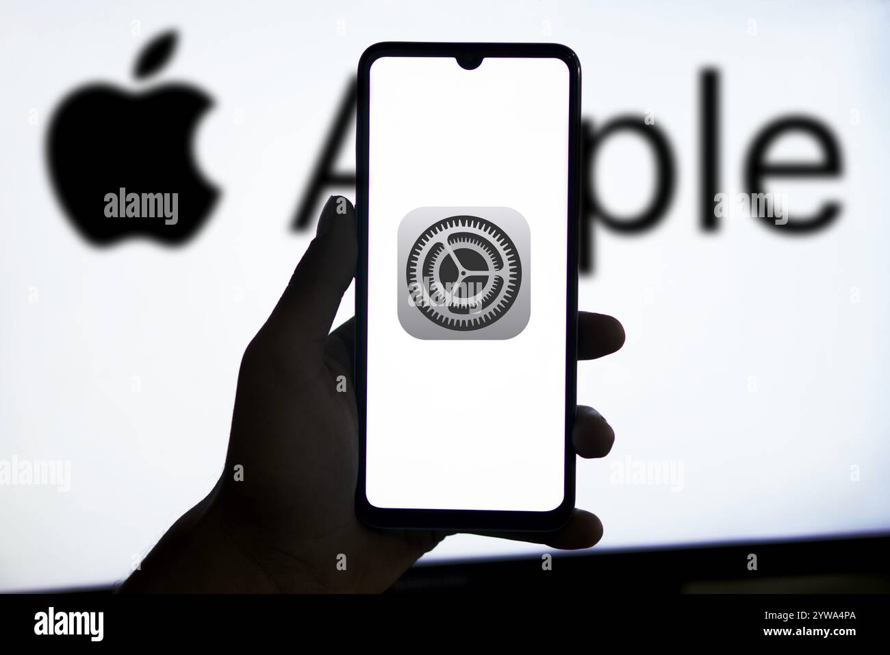 Apple settings icon displayed on smartphone Stock Photo - Alamy