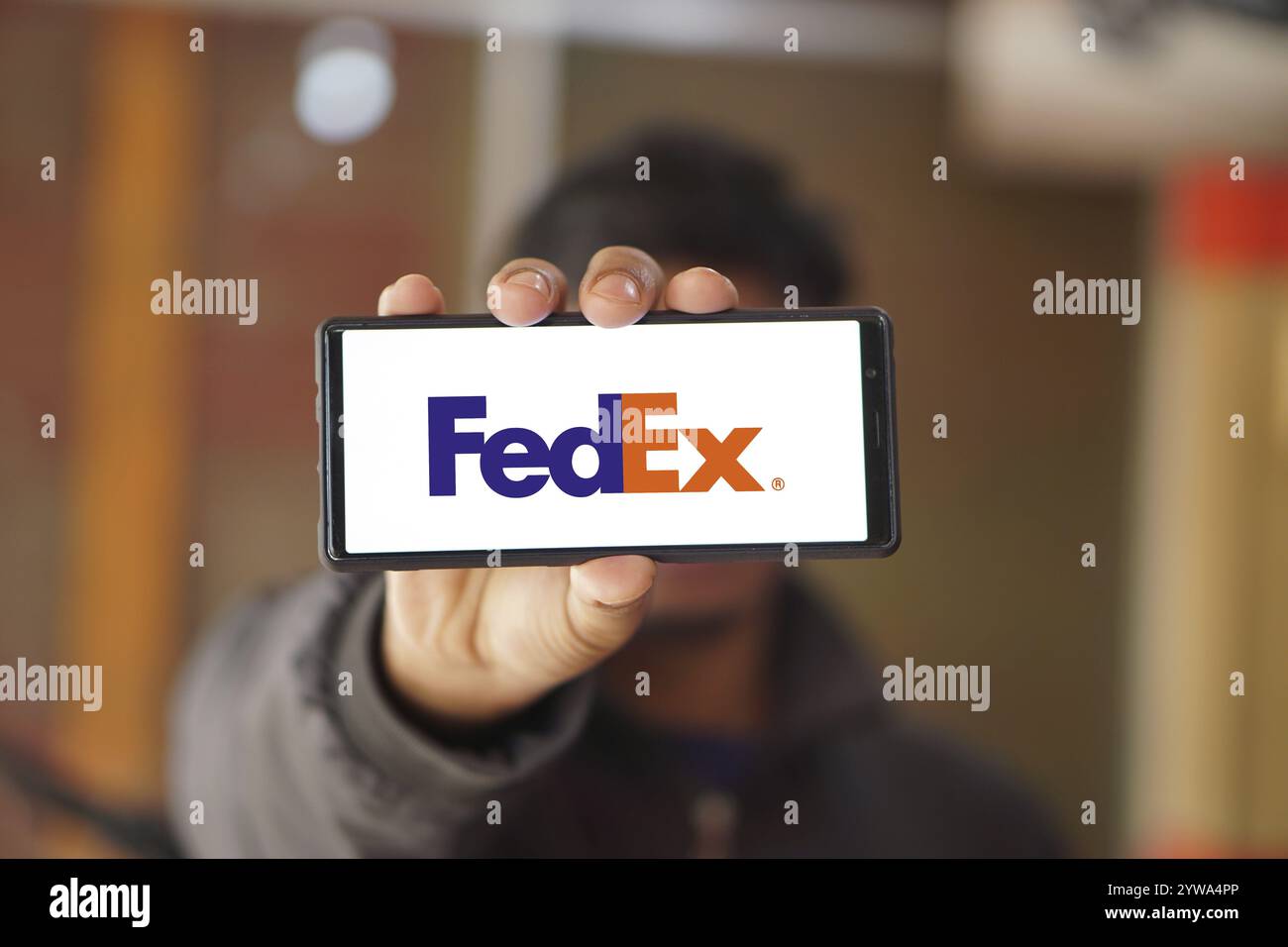 FedEx logo on smartphone Stock Photo - Alamy