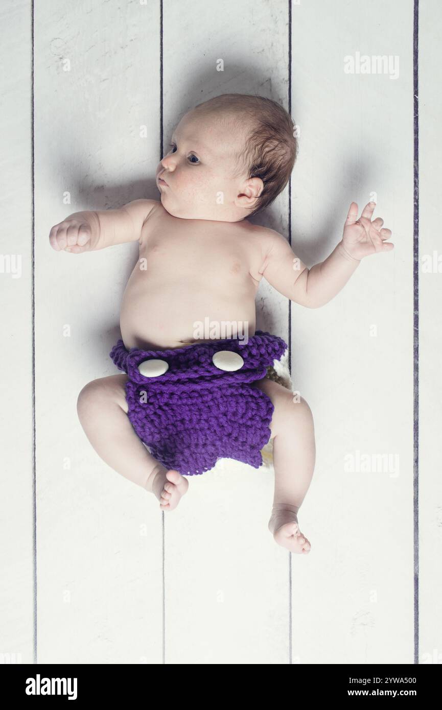 Baby, 1 month, full body portrait in cloth nappy, baby in portrait ...