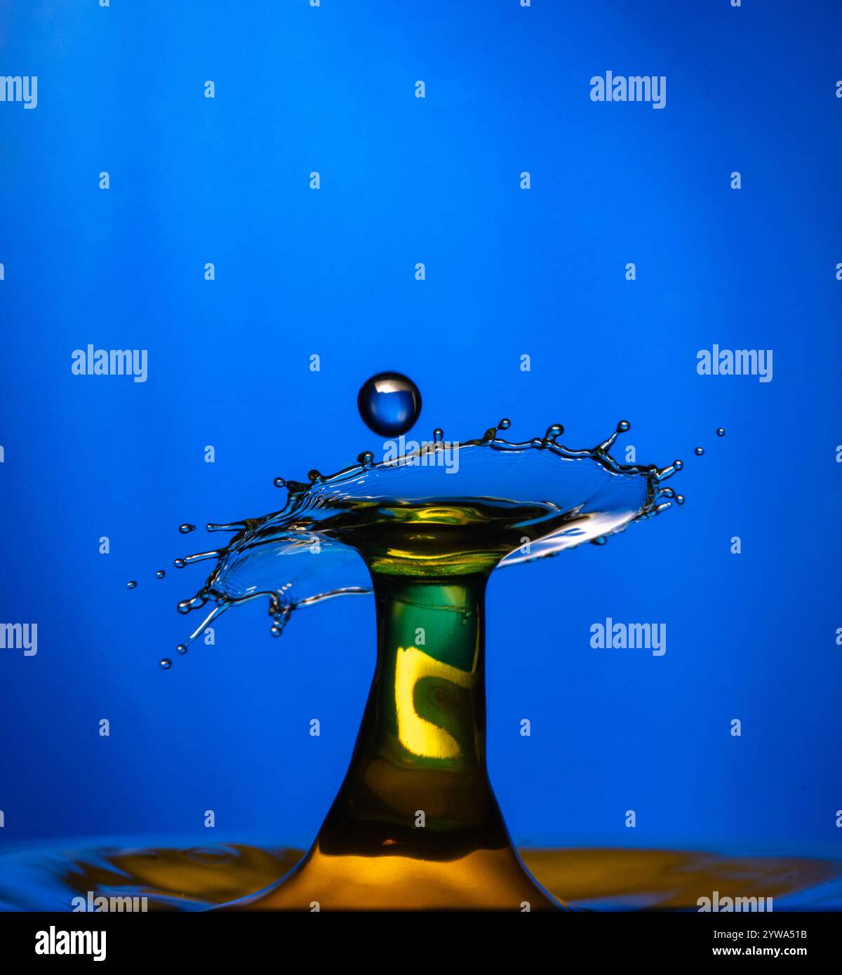 Arresting ethereal colour infused imaginative water collision macro ...