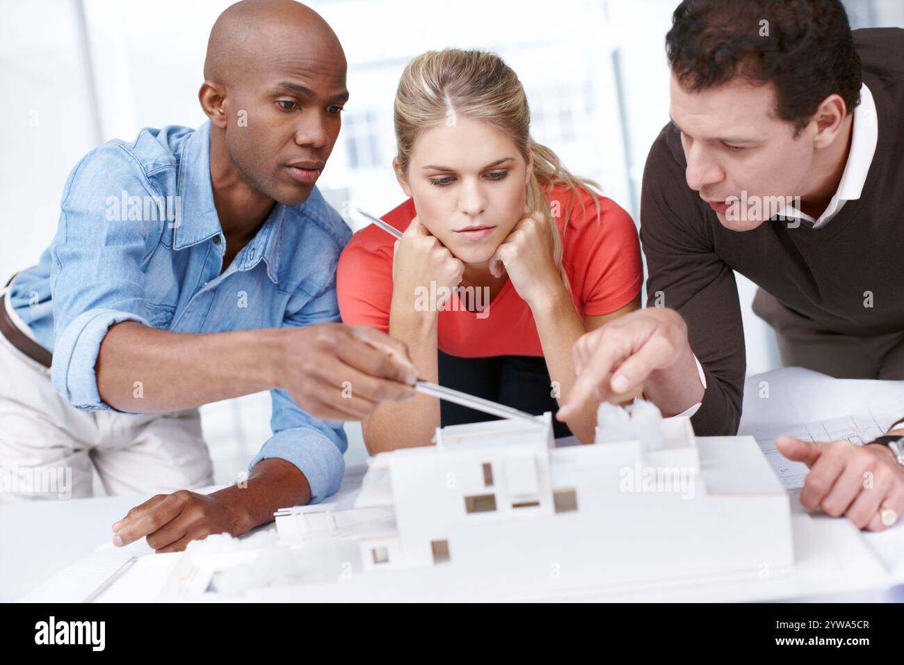 Blueprint, architecture and business people in office, model and ...