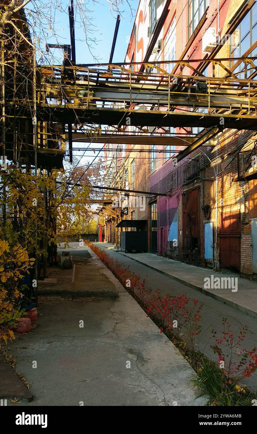 View of the backyard and the facade of the old factory Stock Photo - Alamy