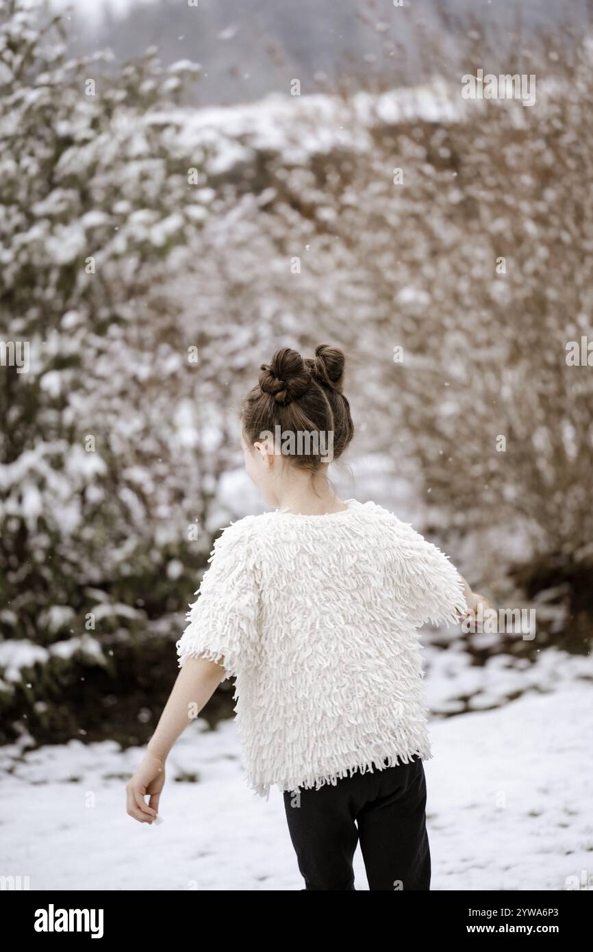 Girl in winter snows in hi-res stock photography and images - Alamy