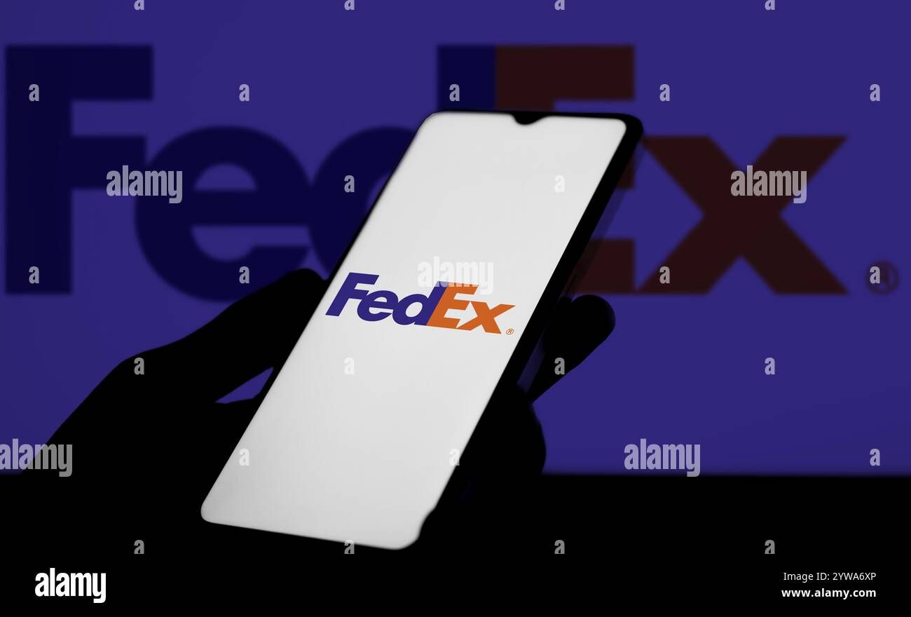 FedEx logo on smartphone Stock Photo - Alamy