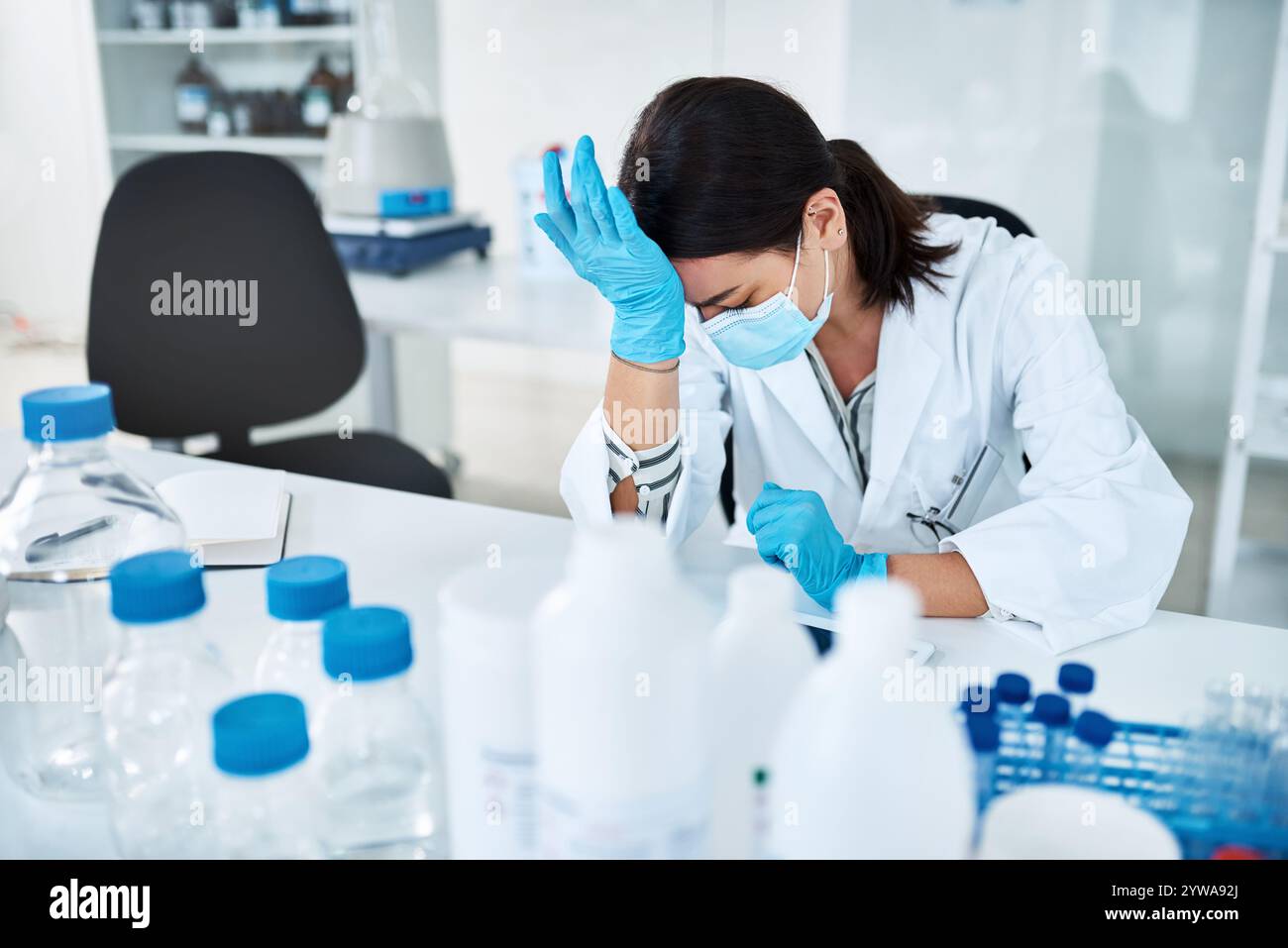 Ppe, scientist and stress as headache in science lab as frustrated ...