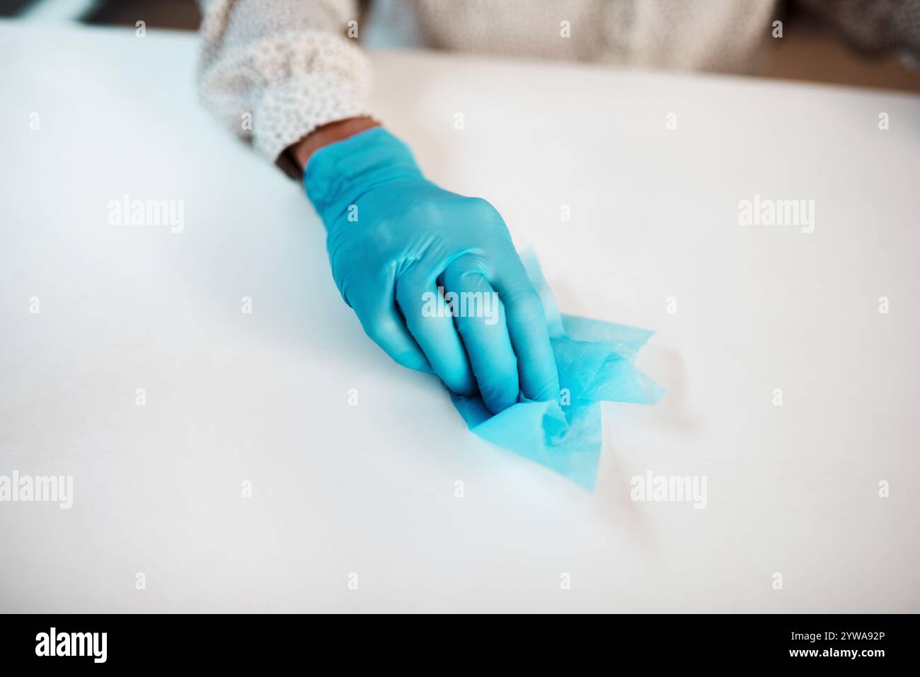 Woman, hands and cleaning desk with cloth in office, professional ...