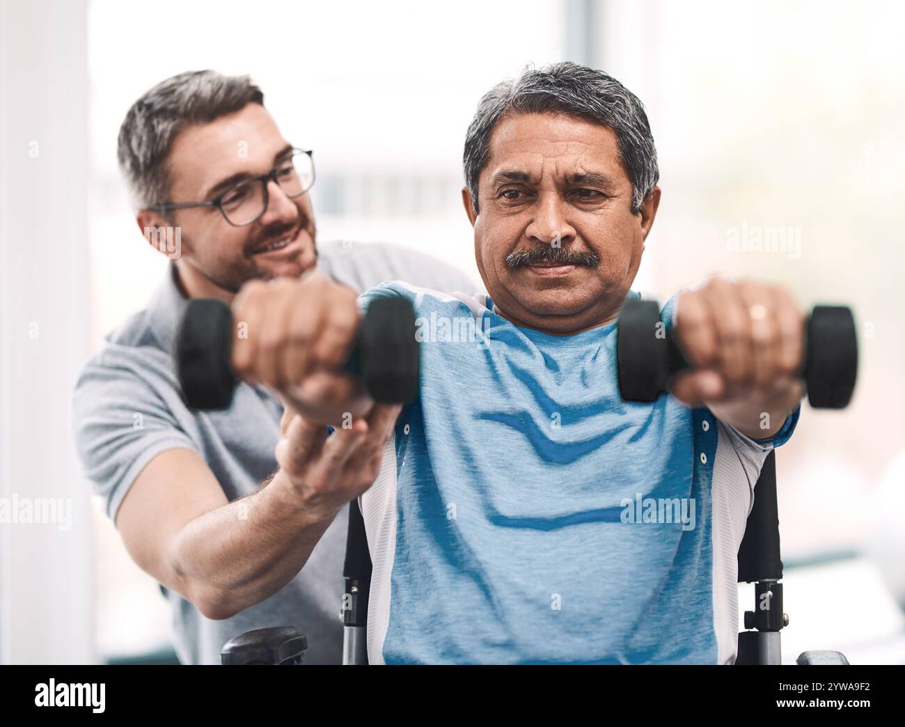 Physical therapy, old man and dumbbells for training at clinic, joint ...