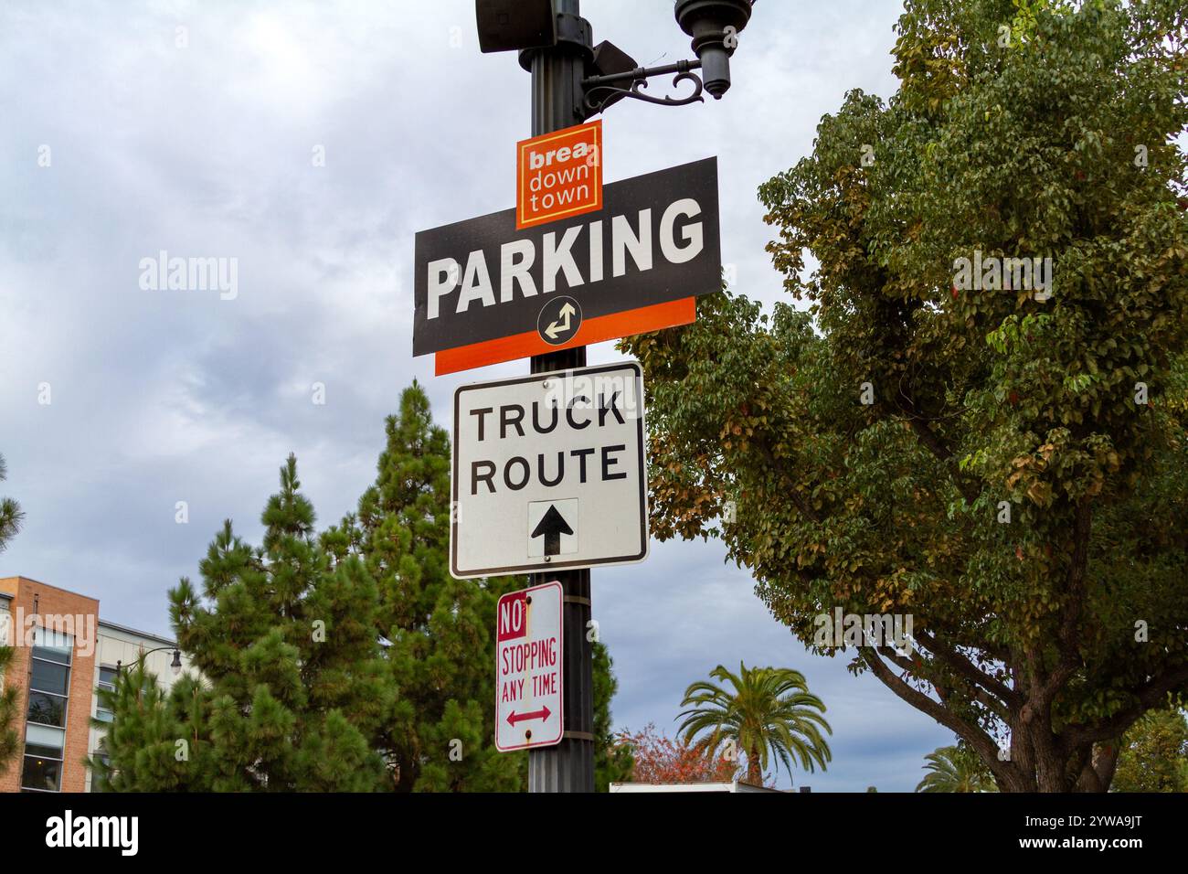 Brea, CA, USA - November 25, 2024: Truck Route and Parking street sign in Downtown Brea ...