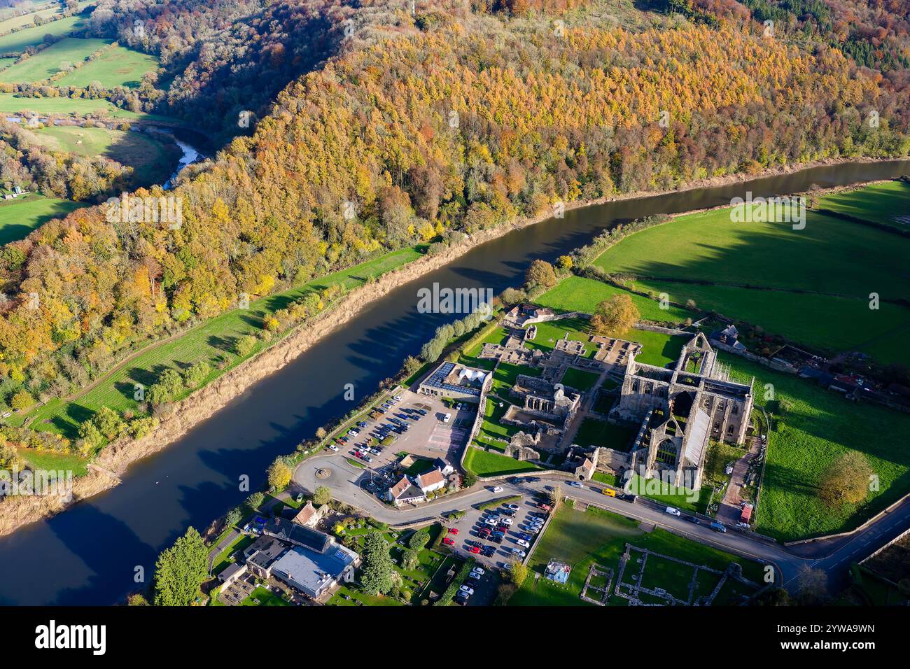 Aerial view of the 12th century ruins of Tintern Abbey, River Wye and ...