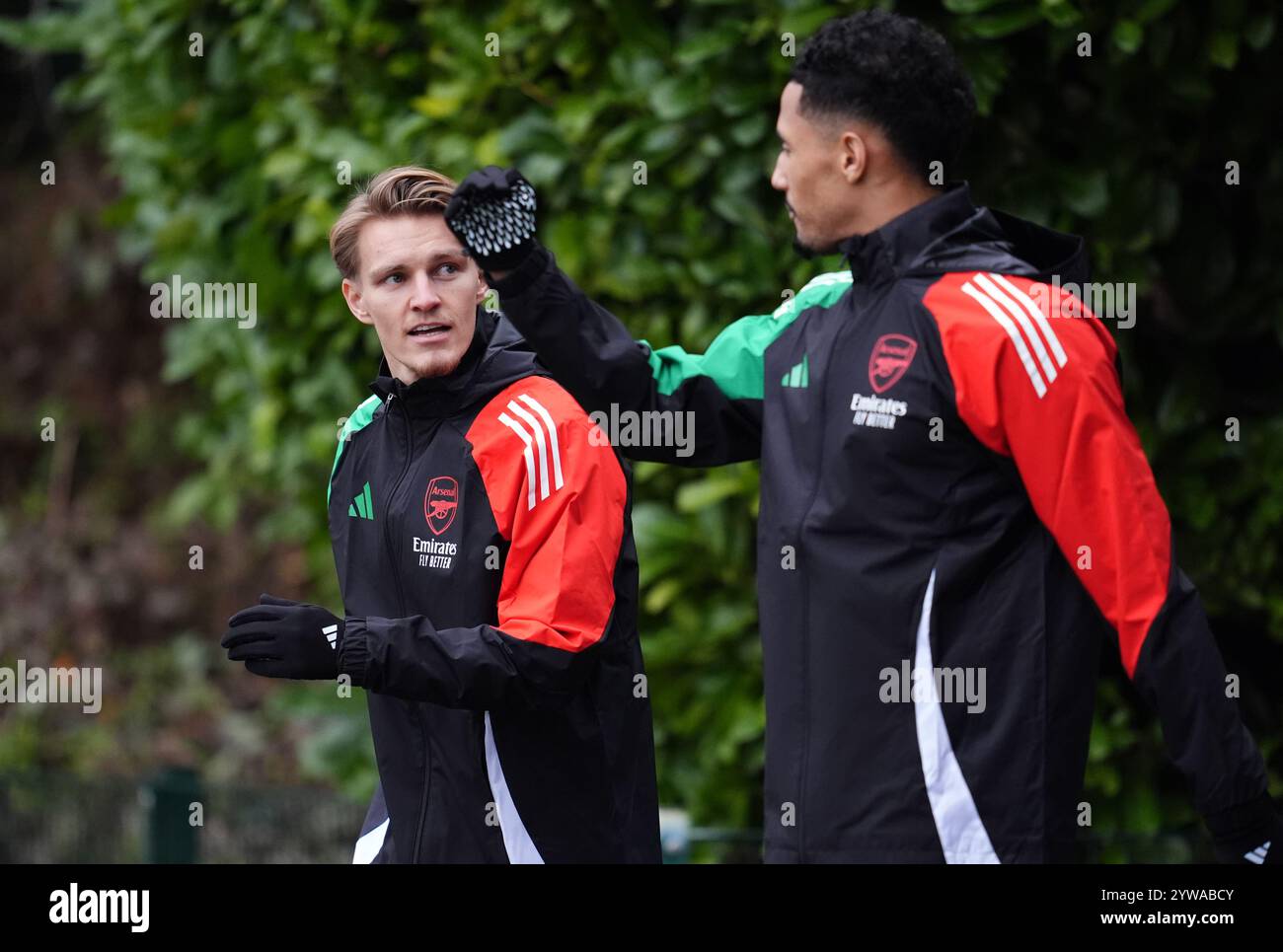 Arsenal's Martin Odegaard (left) with William Saliba during a training ...