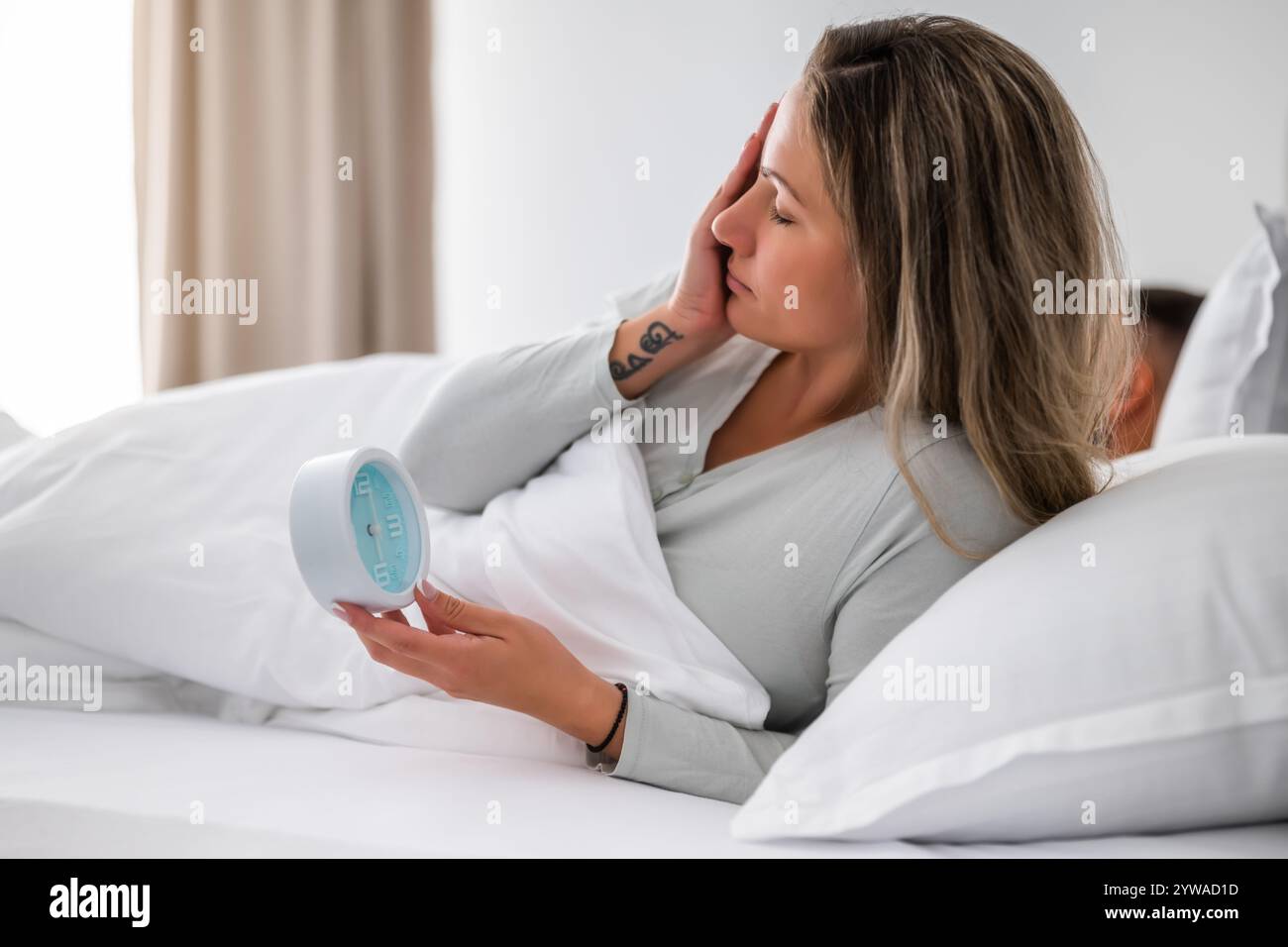 Woman tired morning bed hi-res stock photography and images - Alamy