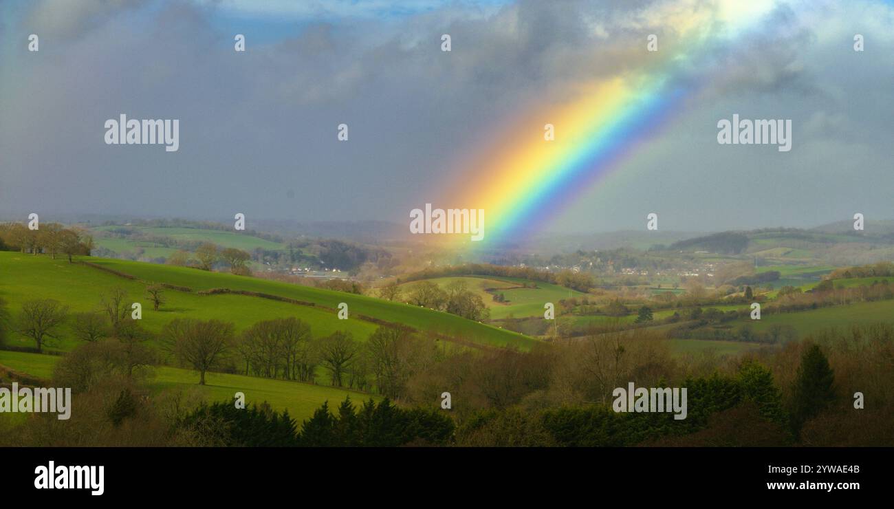 Vivid rainbow falling on a Field in Monmouthshire Stock Photo - Alamy